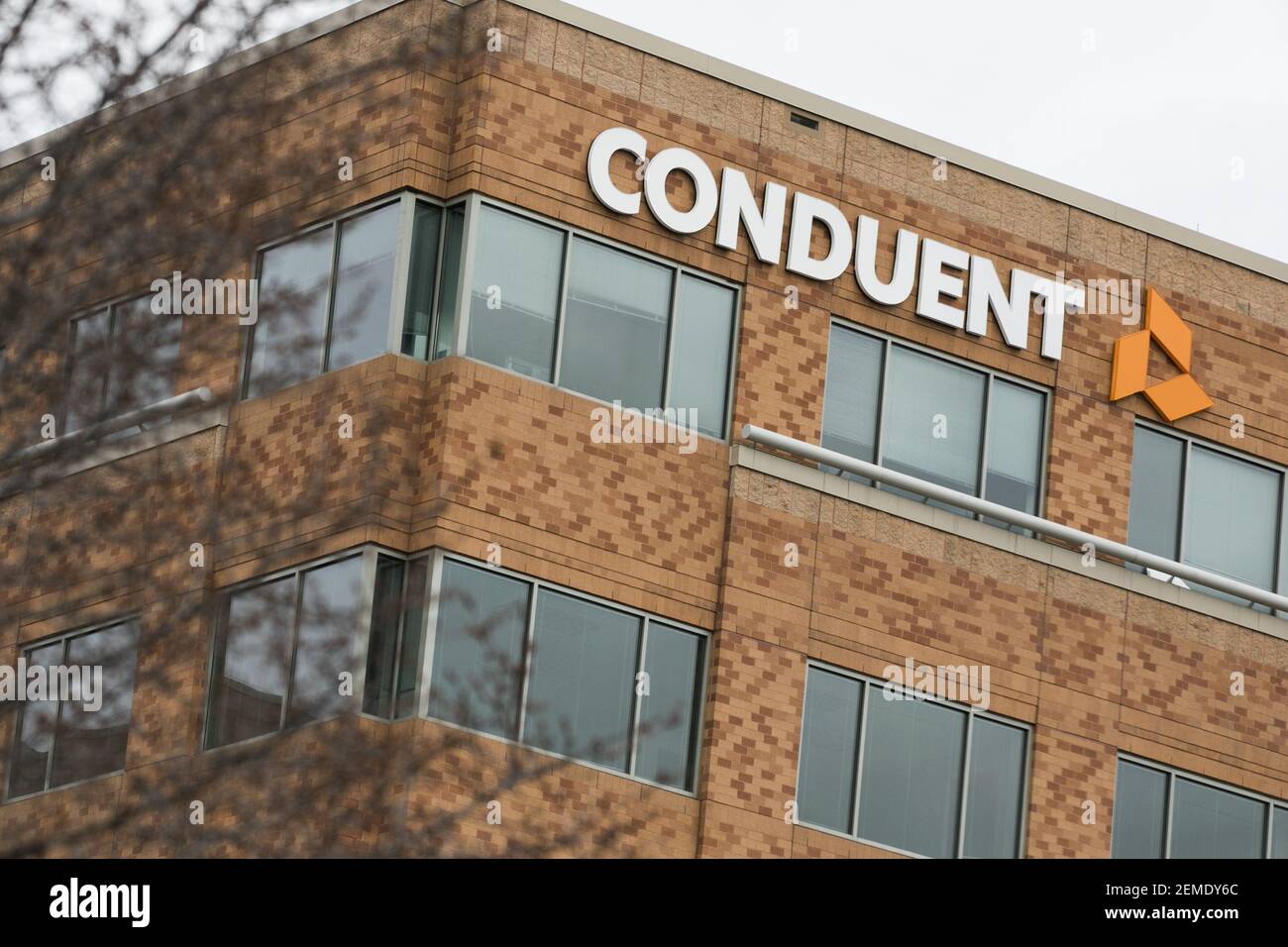 A logo sign outside of a facility occupied by Conduent in Germantown ...