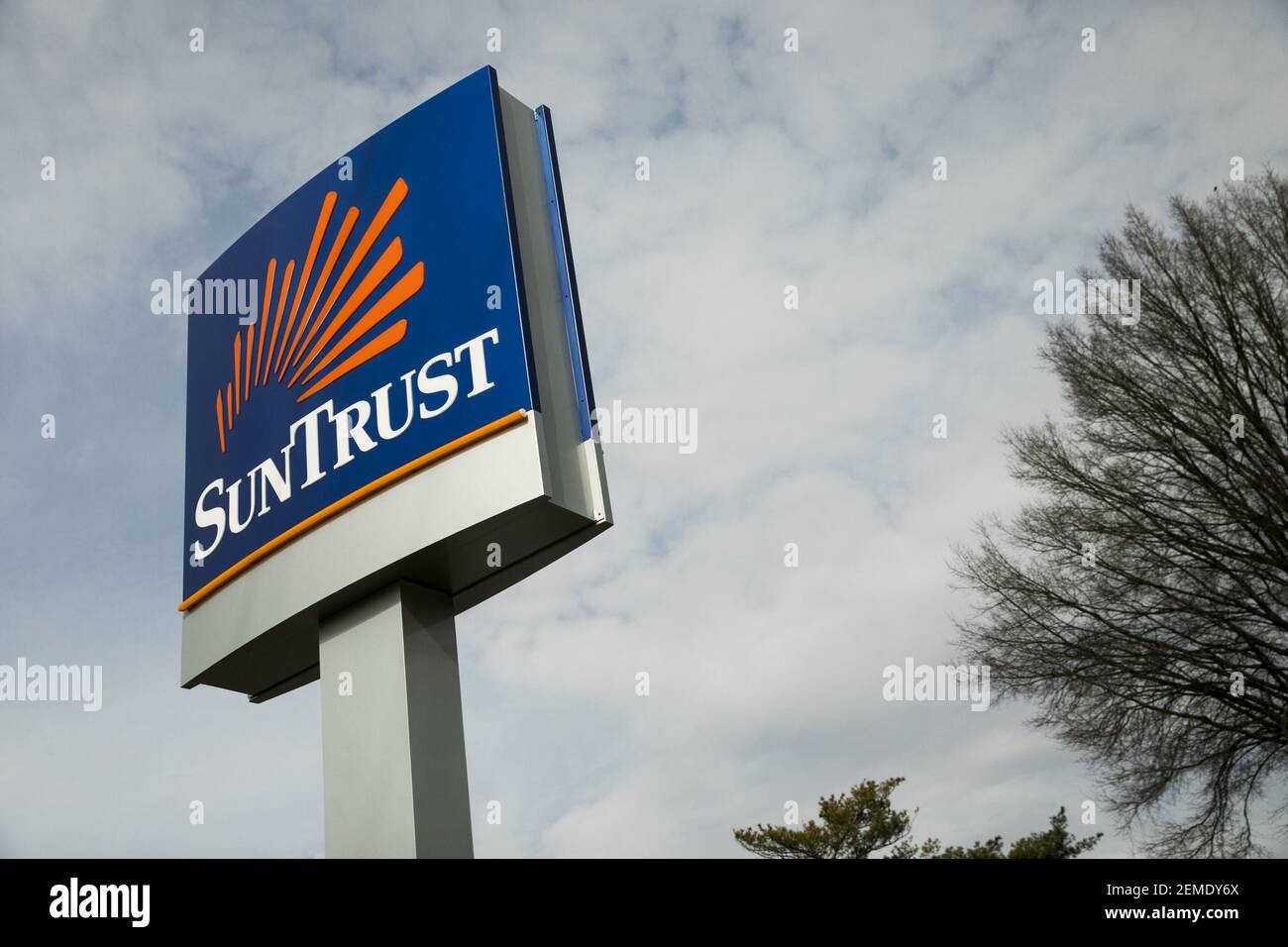 A logo sign outside of a SunTrust Bank branch in Gaithersburg, Maryland ...