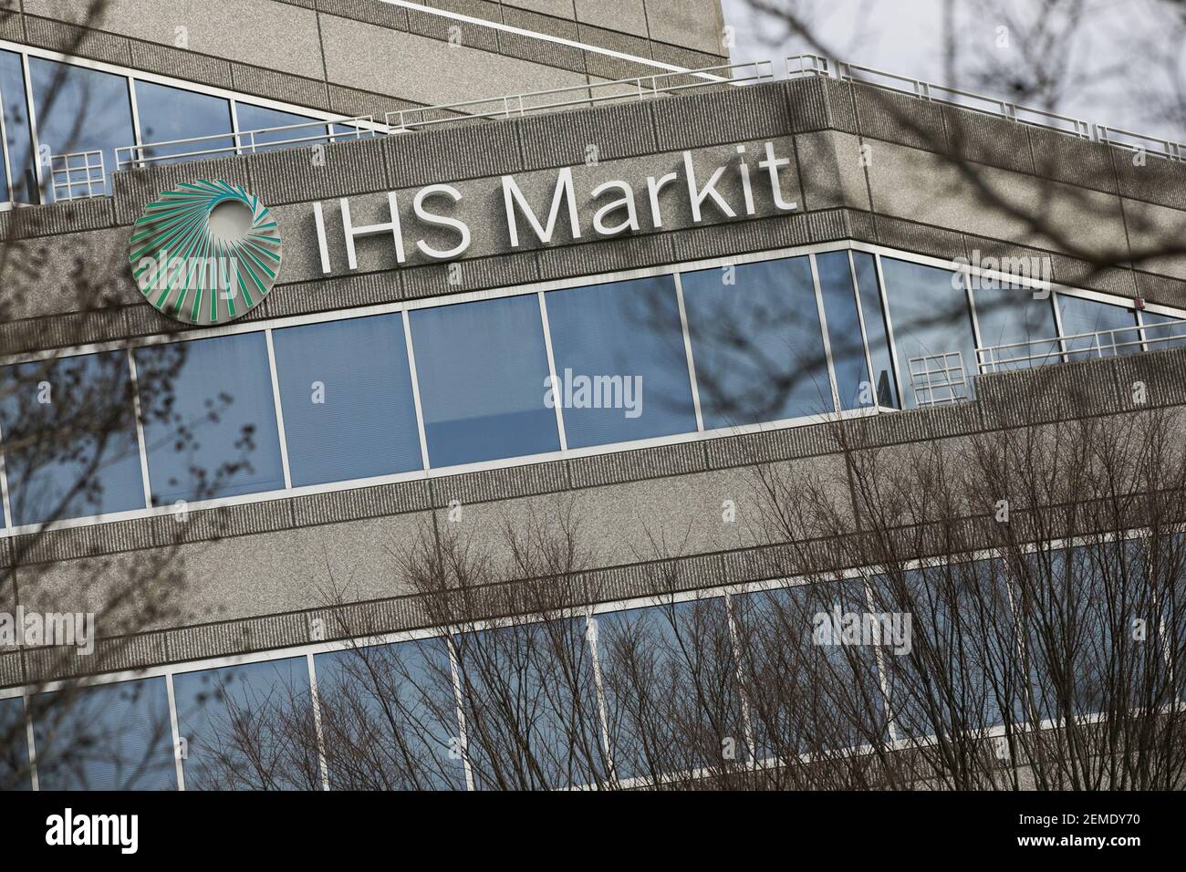 A logo sign outside of a facility occupied by IHS Markit in ...