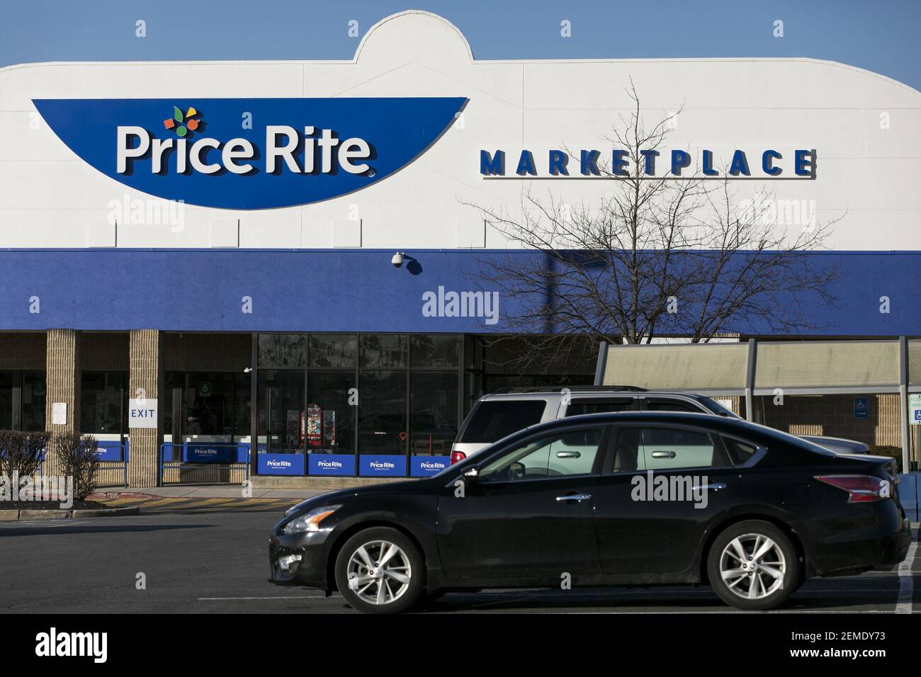 A logo sign outside of a Price Rite retail grocery store location in ...
