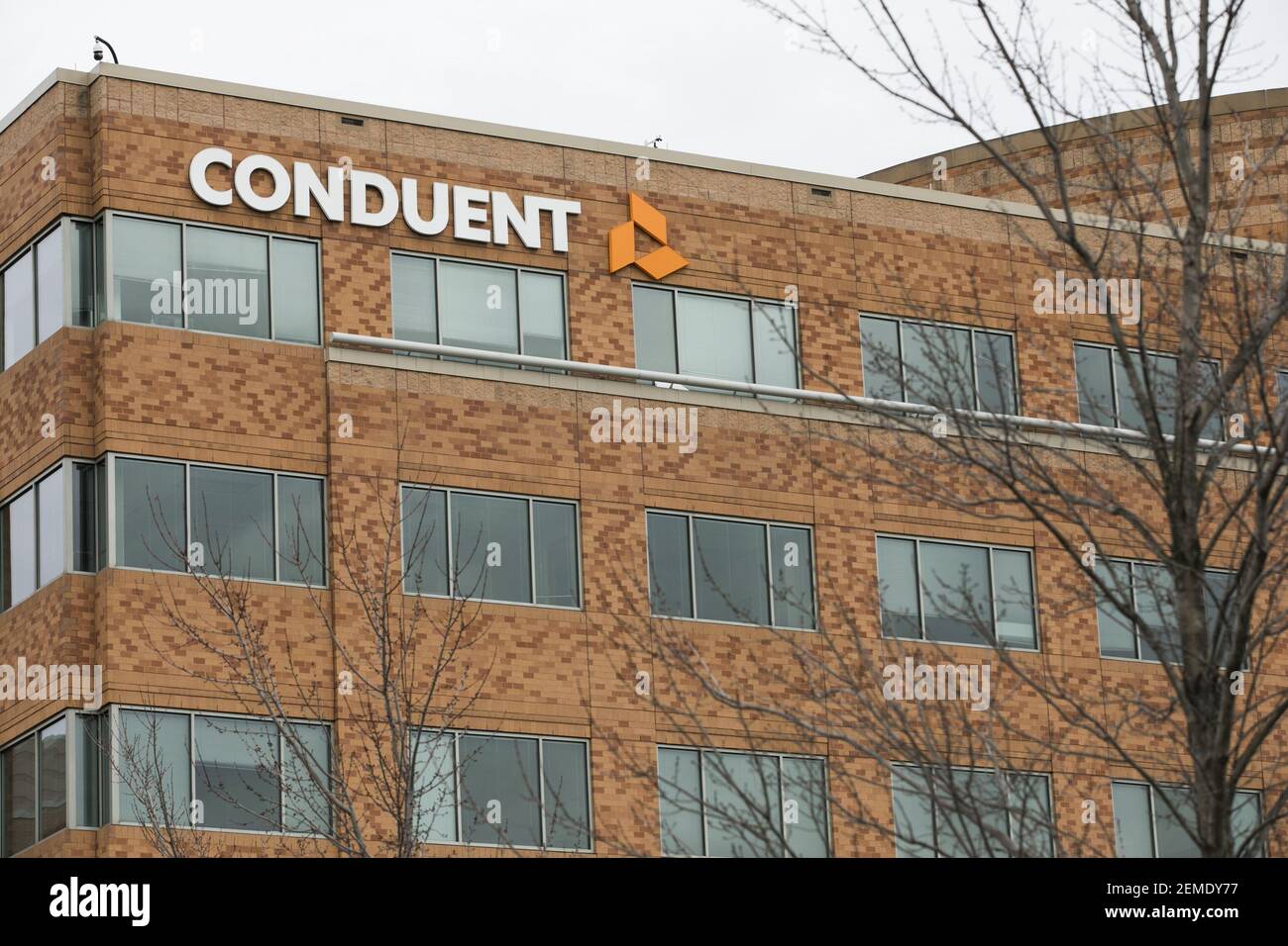A logo sign outside of a facility occupied by Conduent in Germantown ...