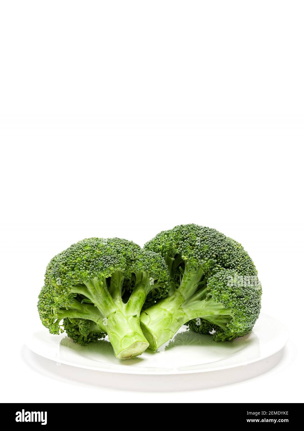 fresh eco-friendly broccoli on white plate Stock Photo - Alamy