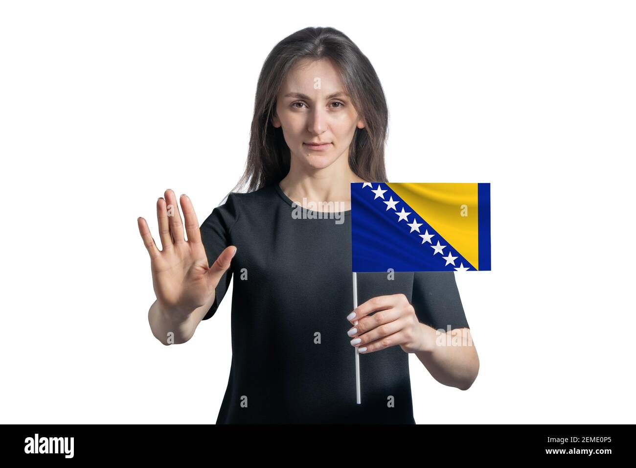 Happy young white woman holding flag of Bosnia and Herzegovina and with ...