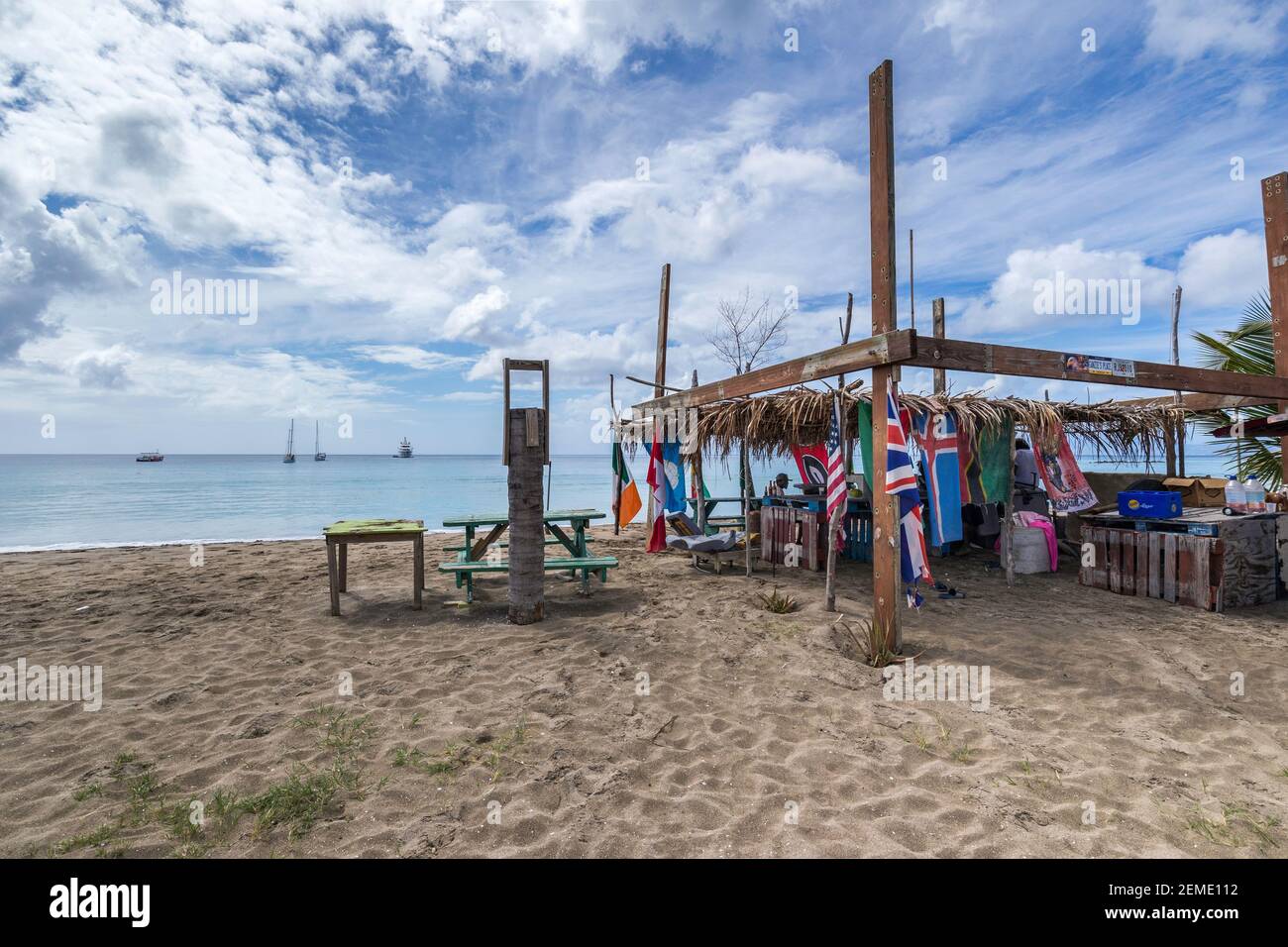 Beach bar, Pinney's Beach on the Caribbean Island of Nevis, bedecked in ...