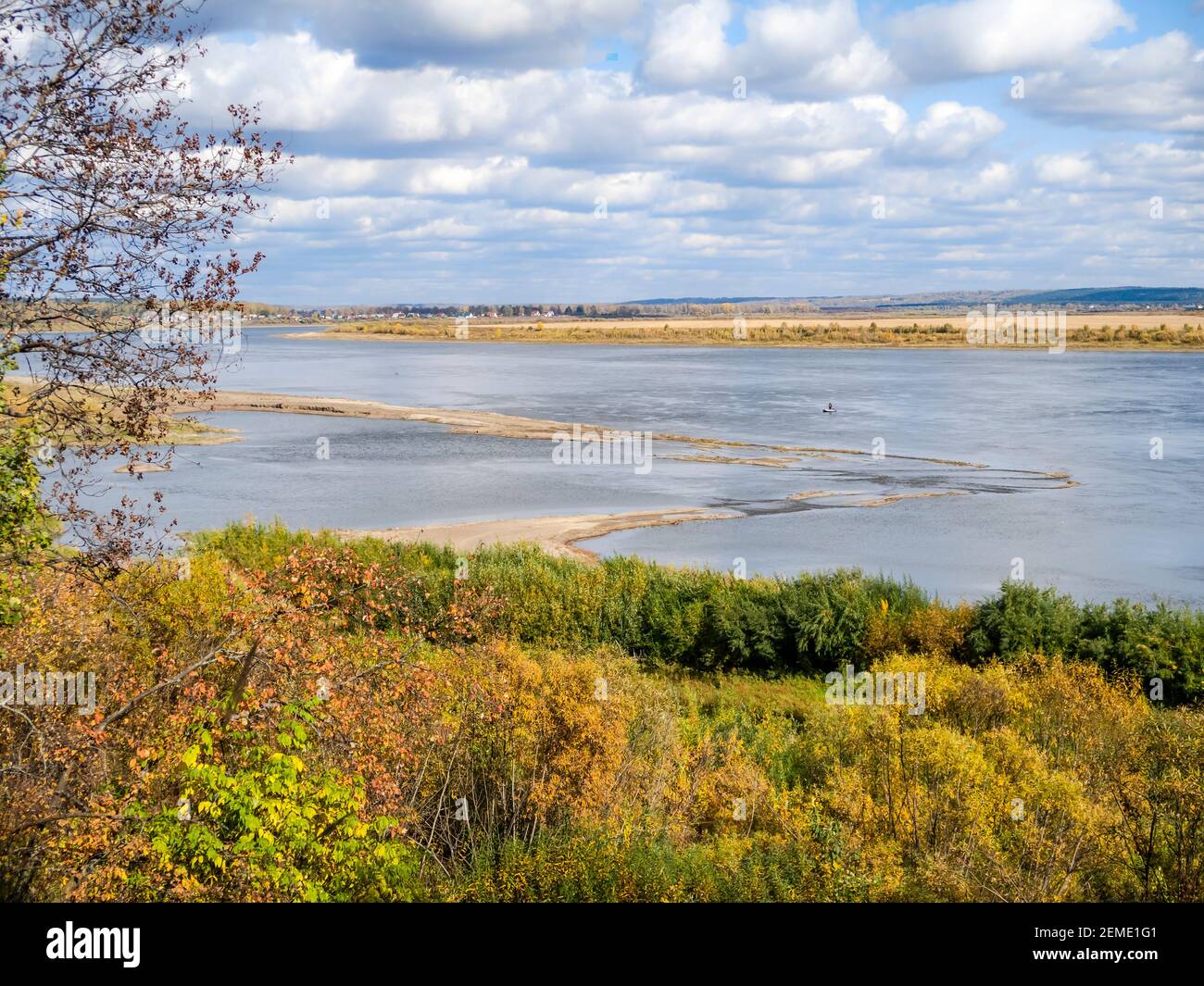 Picturesque view of the Tom river in Siberia in autumn in clear weather ...