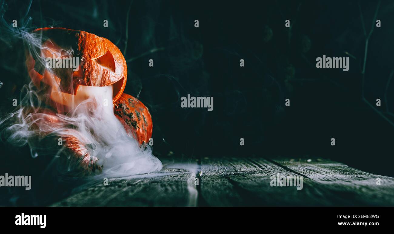 Pumpkin to celebrate Halloween on a wooden background Stock Photo - Alamy