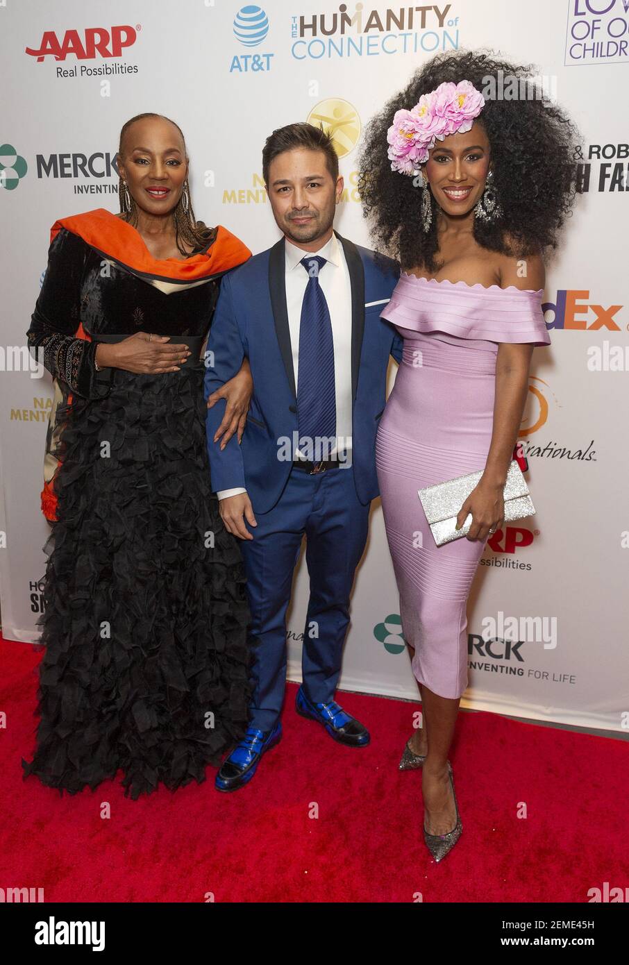 Susan Taylor (L) & Moana Luu (R) wearing dress by House of CB attend ...