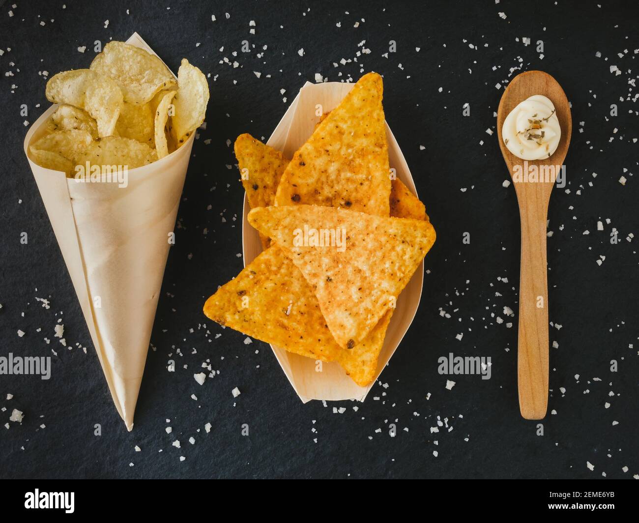 food background. Chips for appetizer. Yellow triangle shaped tortilla ...