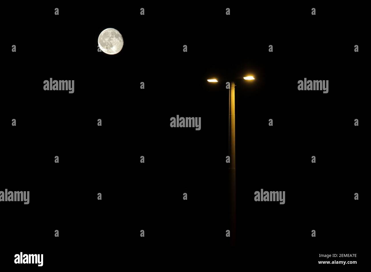 Night city landscape with full moon and street light; color photo Stock ...