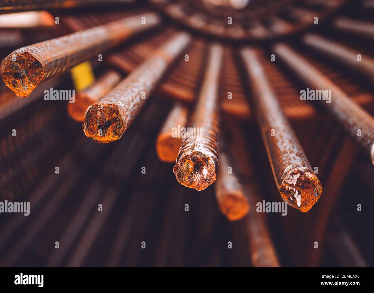 Rusty Iron rods closeup on construction site. Circle Iron Bundle for ...