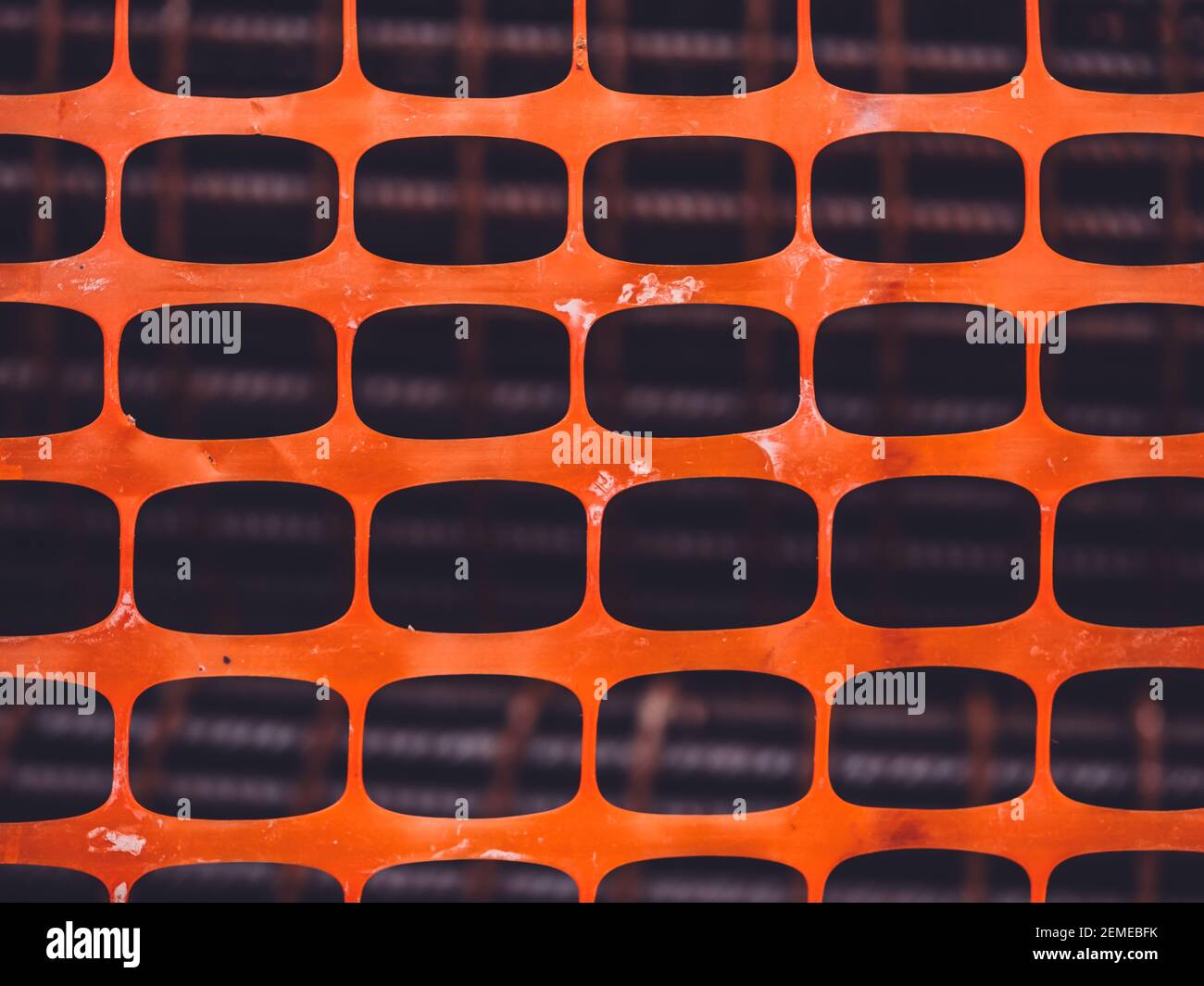 orange plastic net on construction site. Texture background of net ...