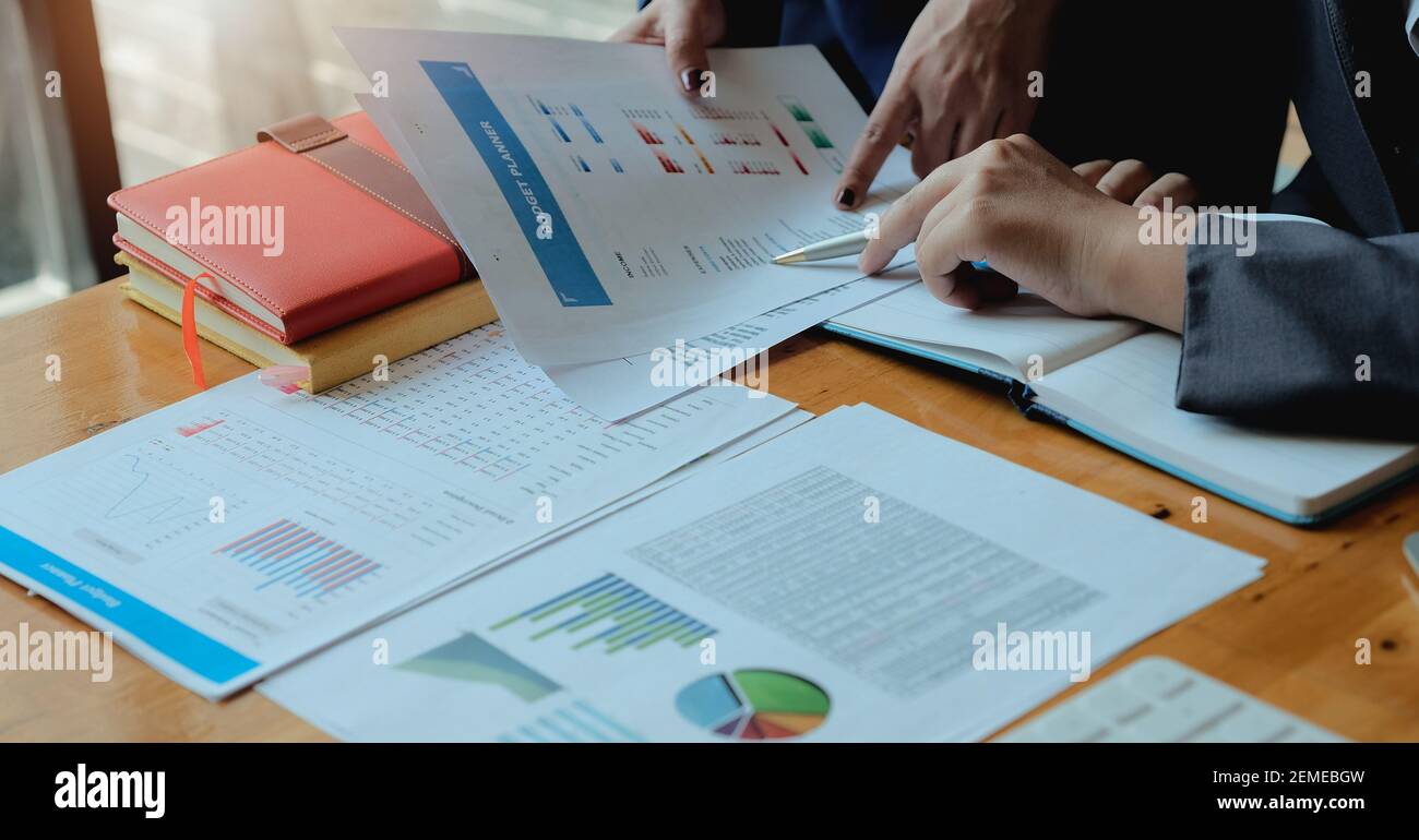 Two accountant discussion analysis sharing calculations about the ...
