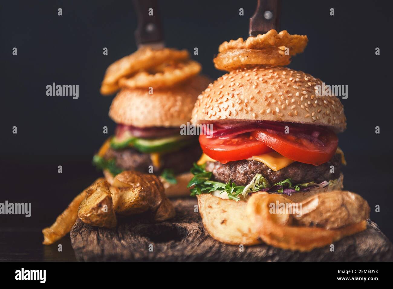 Two mouth-watering, delicious homemade burger used to chop beef. on the ...