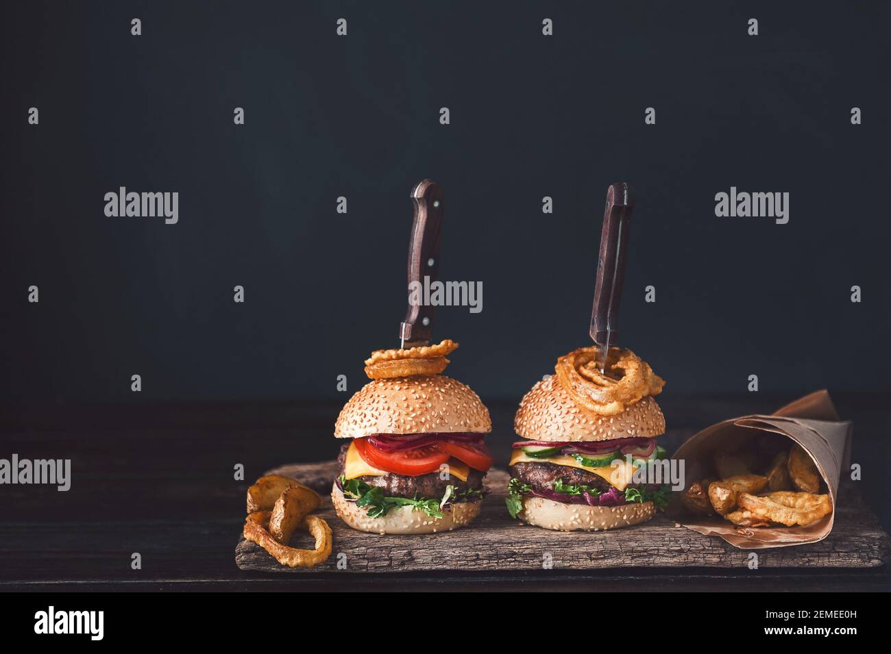 Two mouth-watering, delicious homemade burger used to chop beef. on the ...