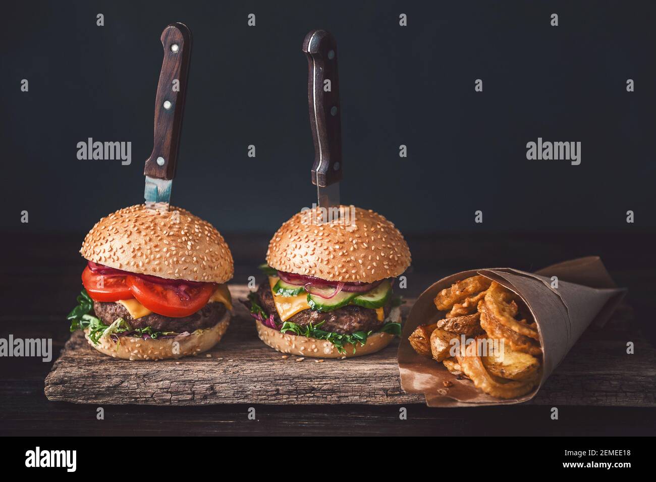 Two mouth-watering, delicious homemade burger used to chop beef. on the ...