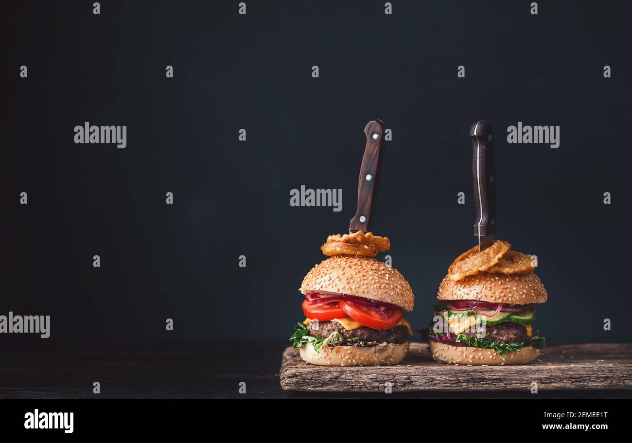 Two mouth-watering, delicious homemade burger used to chop beef. on the ...