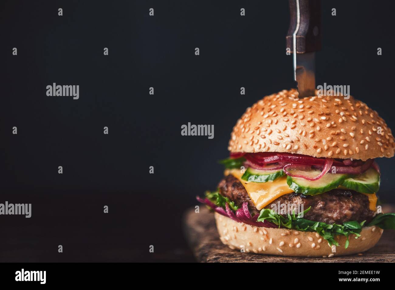 mouth-watering, delicious homemade burger used to chop beef. on the ...