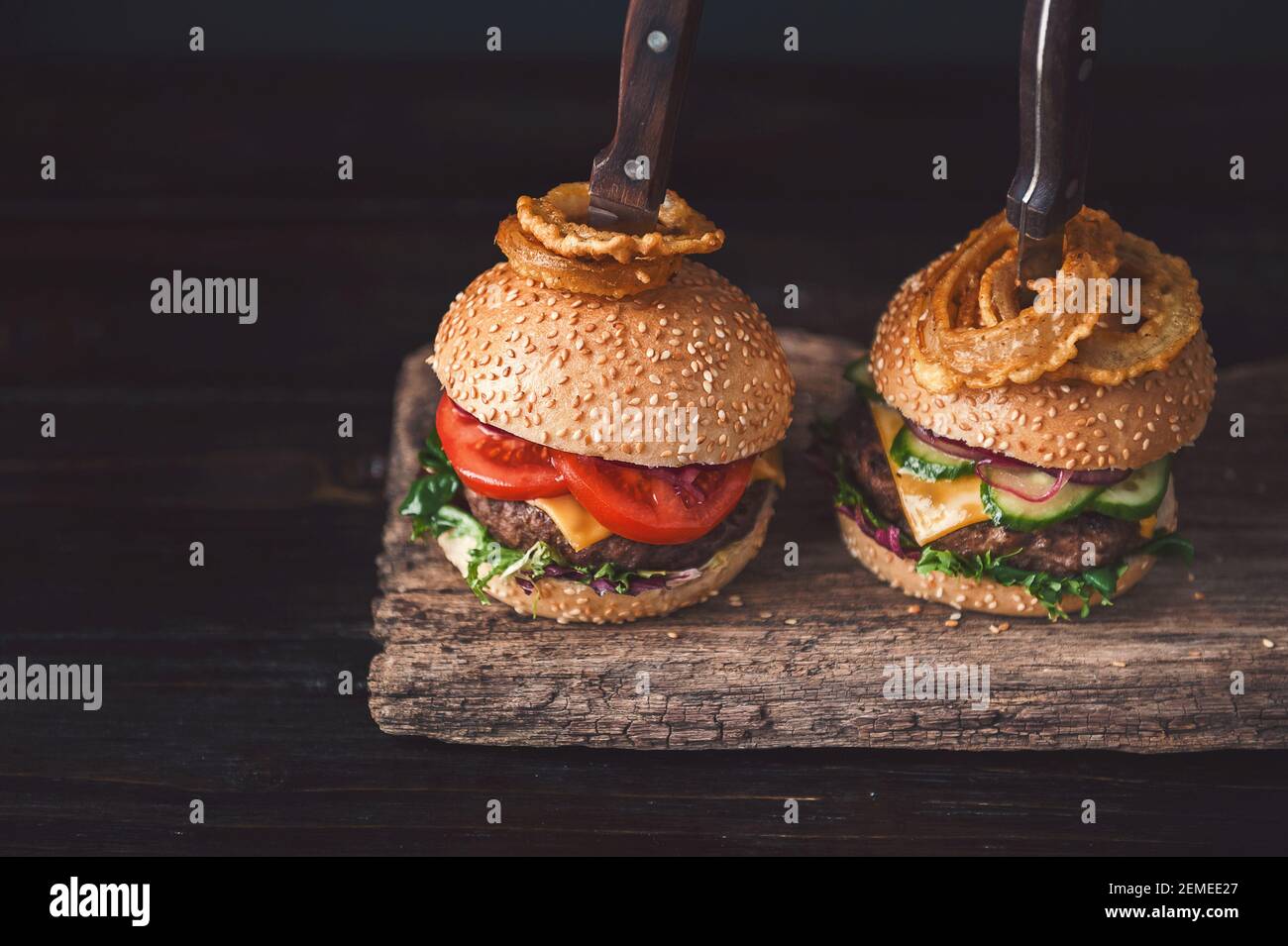 Two mouth-watering, delicious homemade burger used to chop beef. on the ...