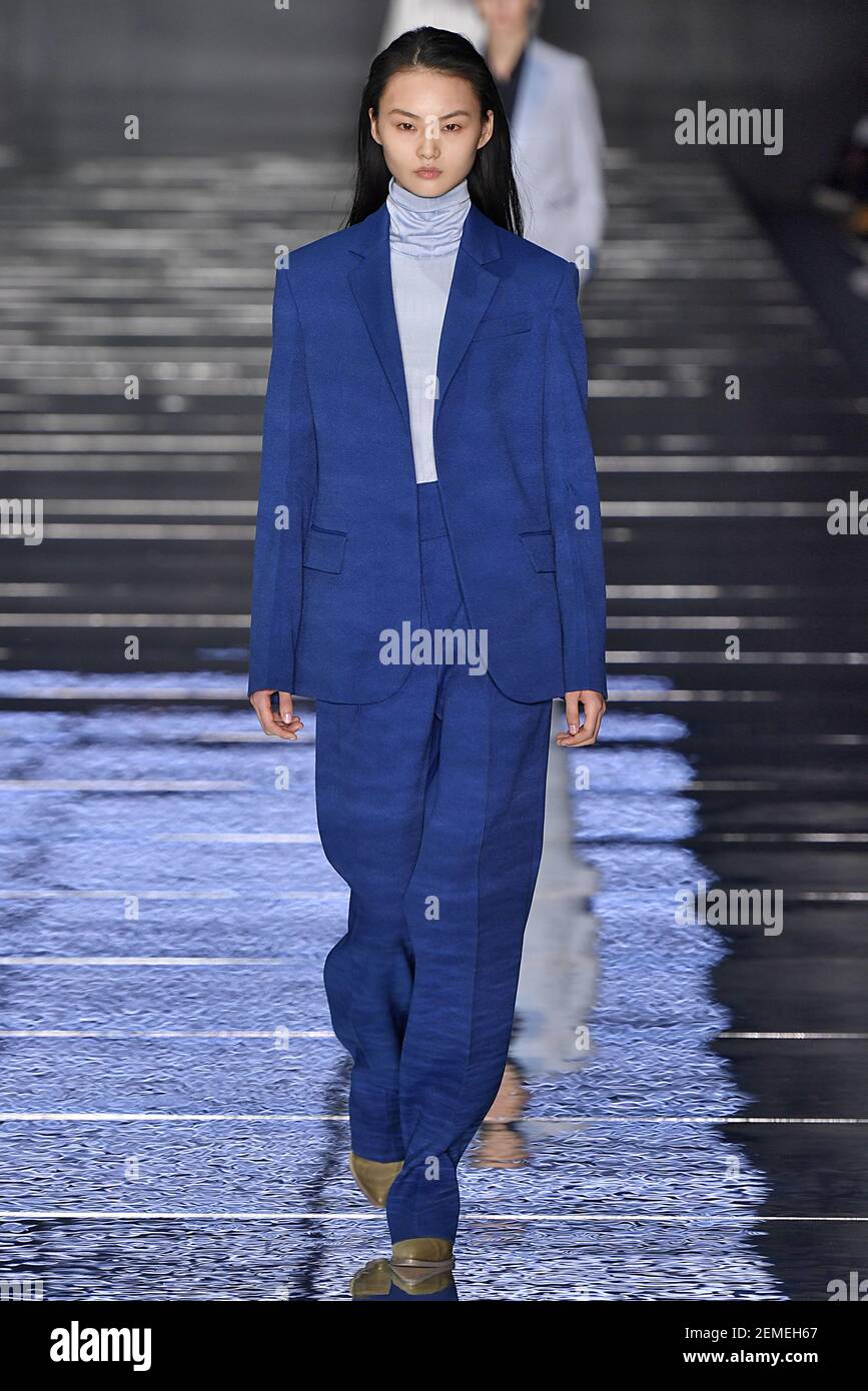 He Cong walks on the runway during the Boss Ready To Wear Fashion Show ...