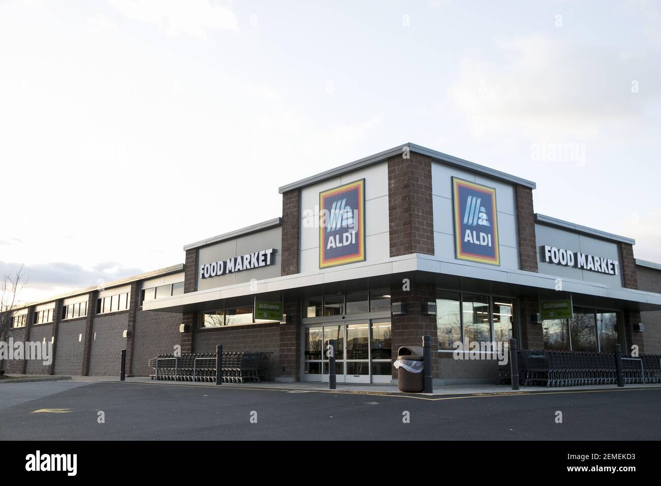 A logo sign outside of a Aldi retail grocery store in Winchester ...