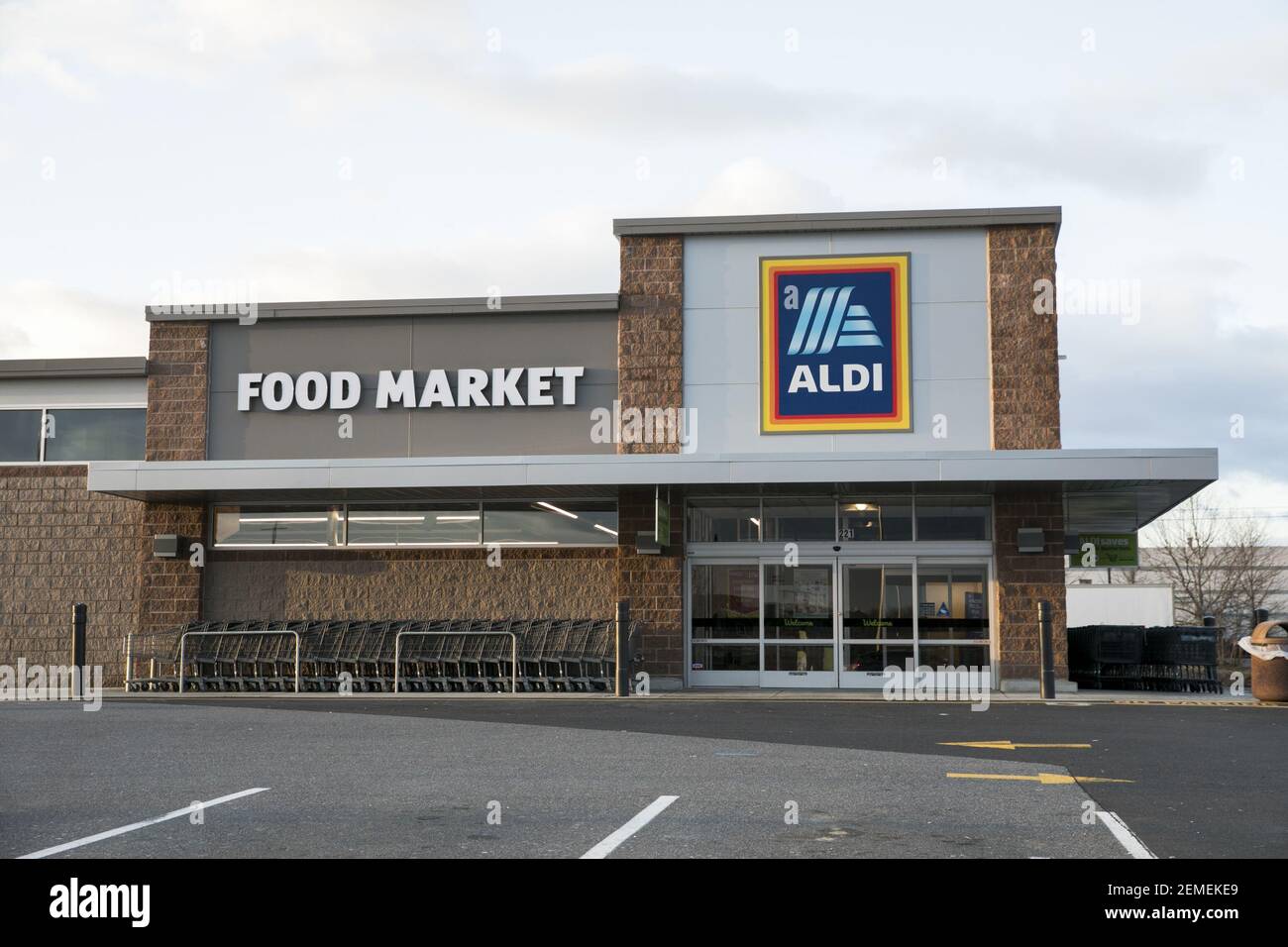 A logo sign outside of a Aldi retail grocery store in Winchester ...