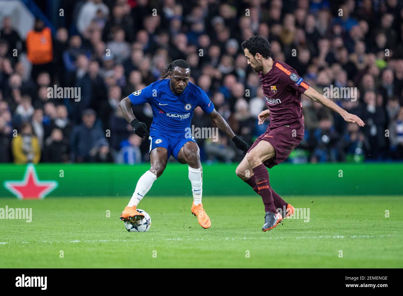 LONDON, ENGLAND - FEBRUARY 20: Victor Moses, Sergio Busquets during the ...