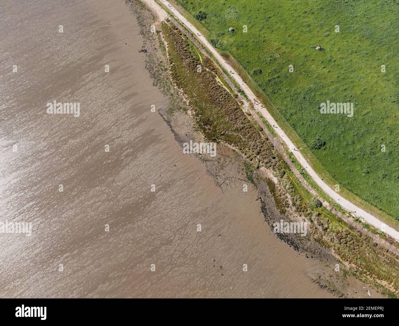 Aerial view of a small walkway path along Tagus river in Lisbon ...