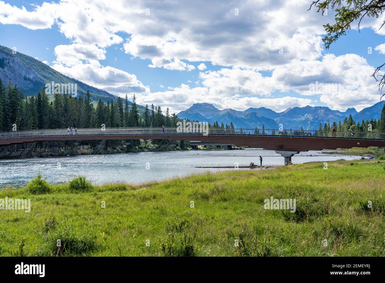 Banff Pedestrian Bridge and Bow River trail in summer sunny day. Banff ...
