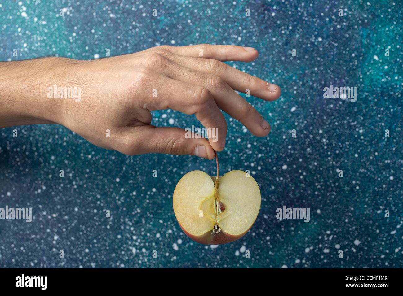 Man hold apple hi-res stock photography and images - Alamy