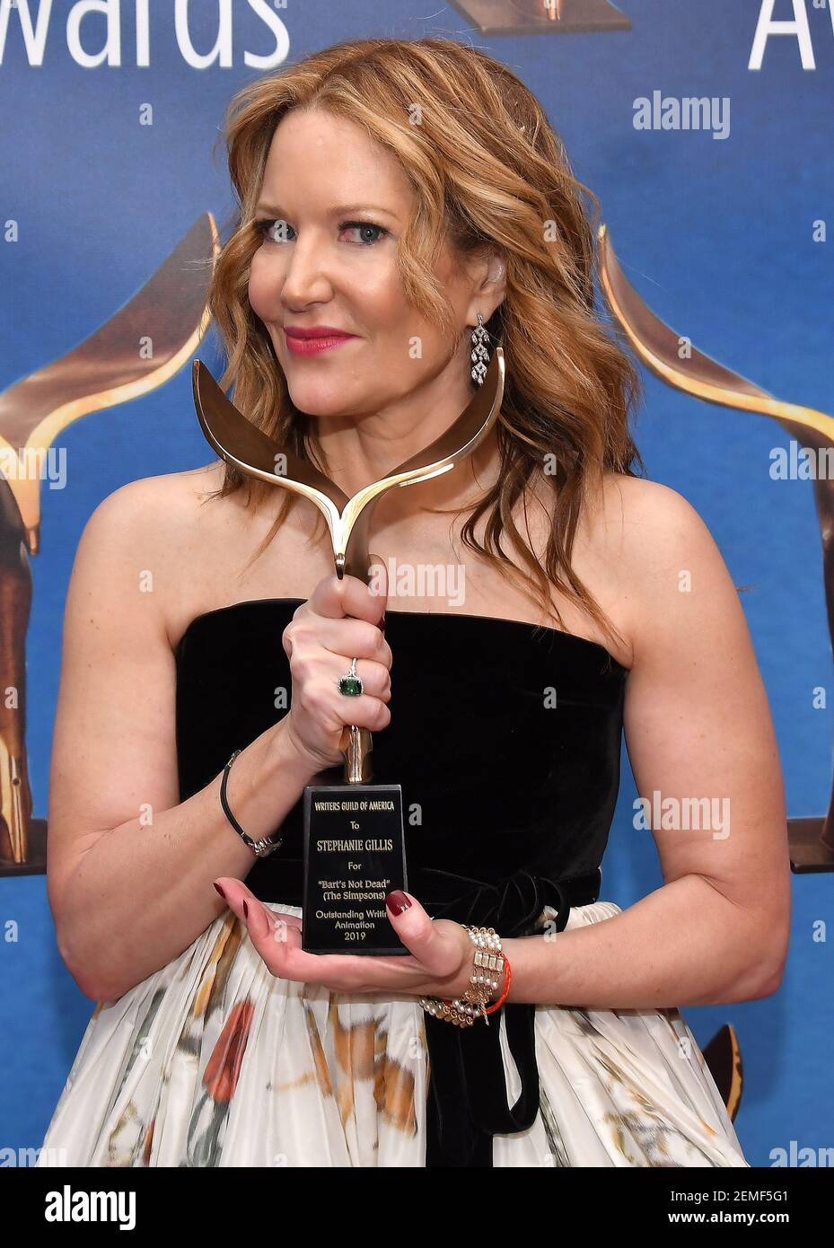 Stephanie Gilles poses in the press room during the 2019 Writers Guild ...