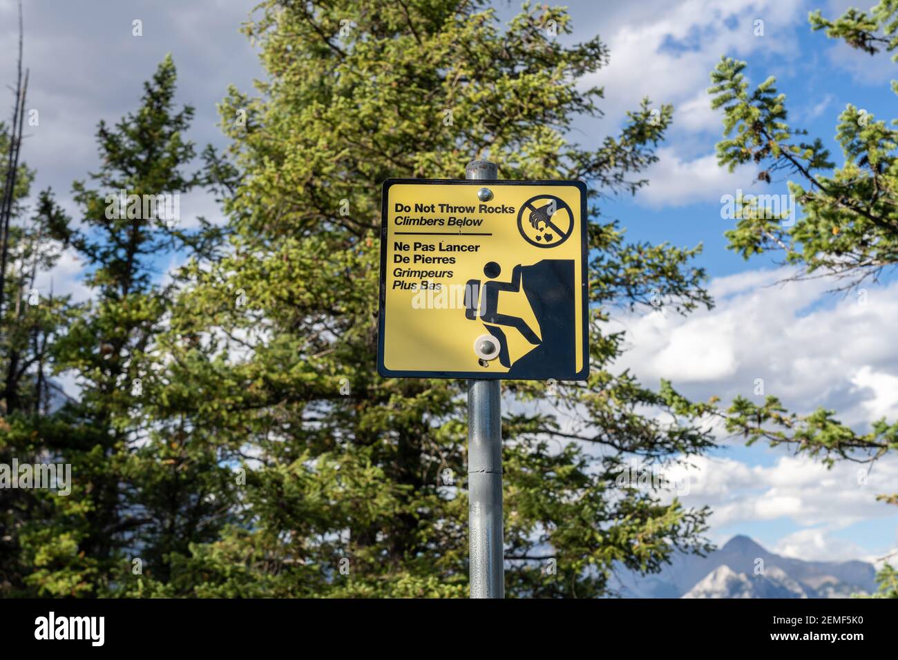 Do not throw rocks climbers below warning sign signpost at Tunnel ...