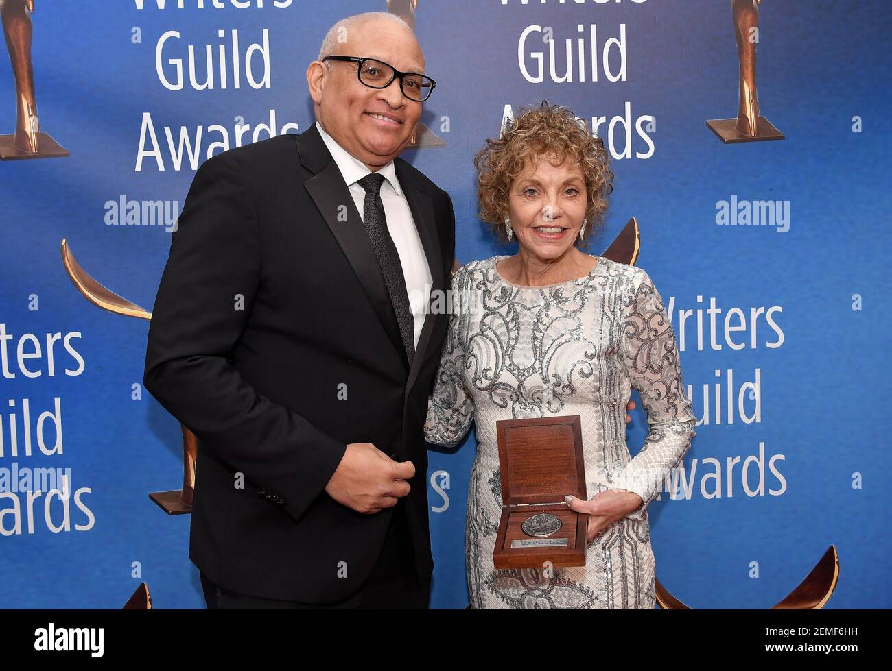 Larry Wilmore and Joan Meyerson pose in the press room during the 2019 ...