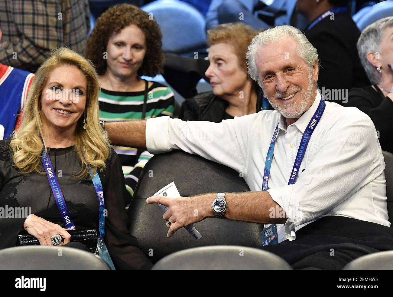 Former NBA head coach and basketball executive Pat Riley, right, sits ...