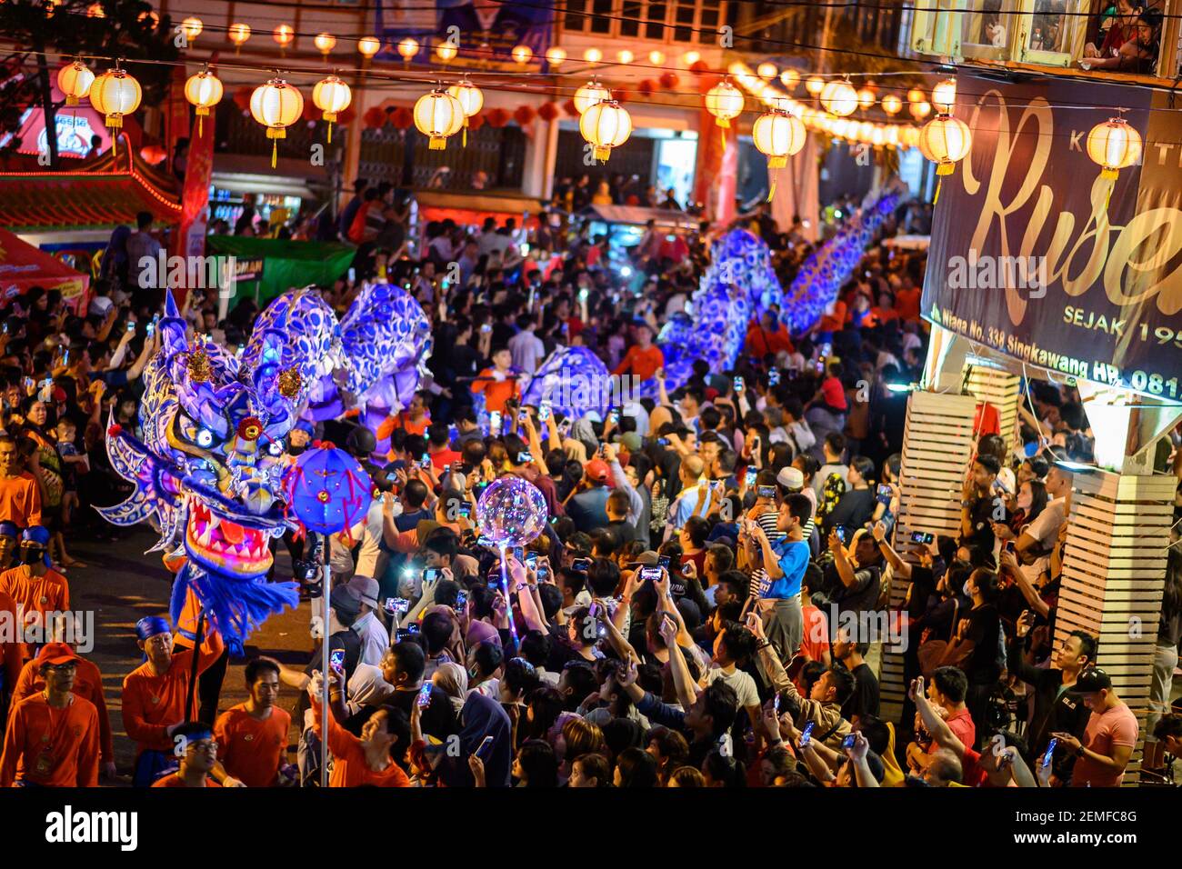 Participants seen performing with a replica of a dragon during the Cap ...