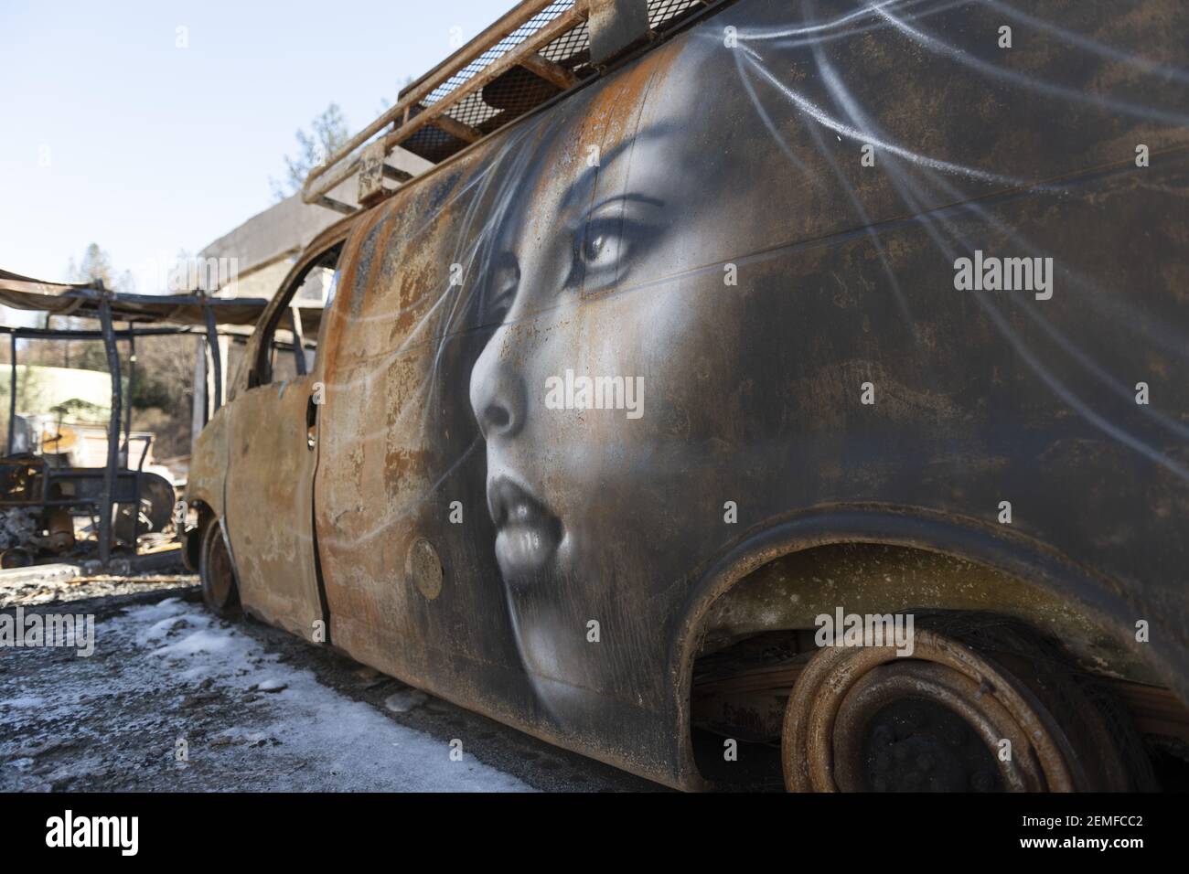 A mural painted by artist Shane Grammer is seen in a destroyed van in ...