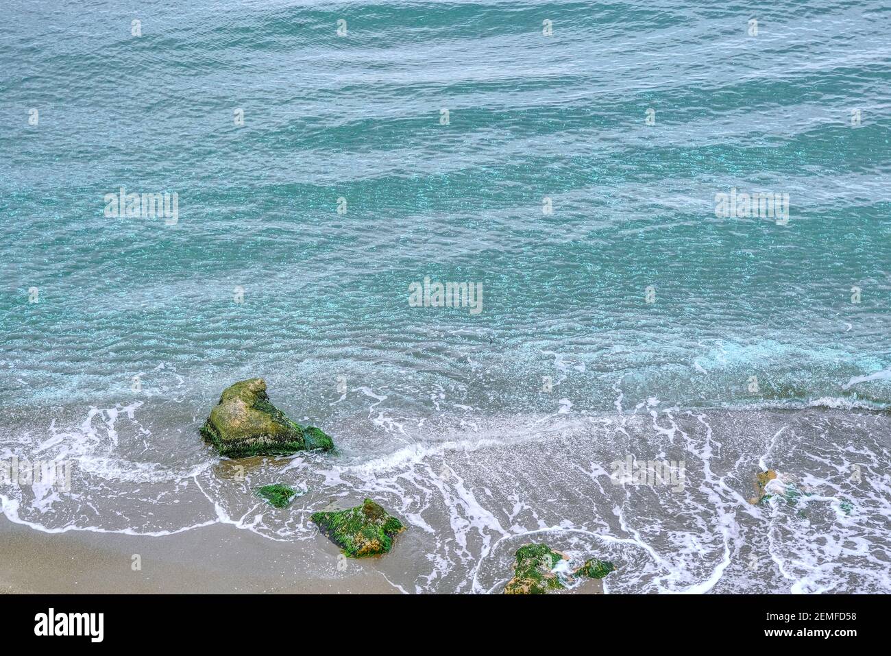clean, turquoise color sea side of Marmara in Mudanya, Bursa. Stones on ...