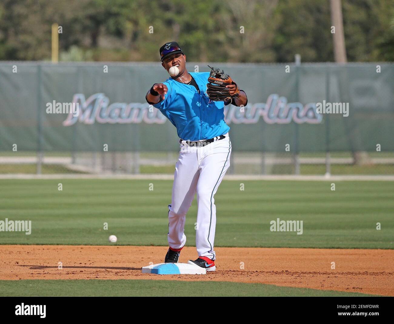 Miami Marlins infielder Starlin Castro (13) throws to first base during ...