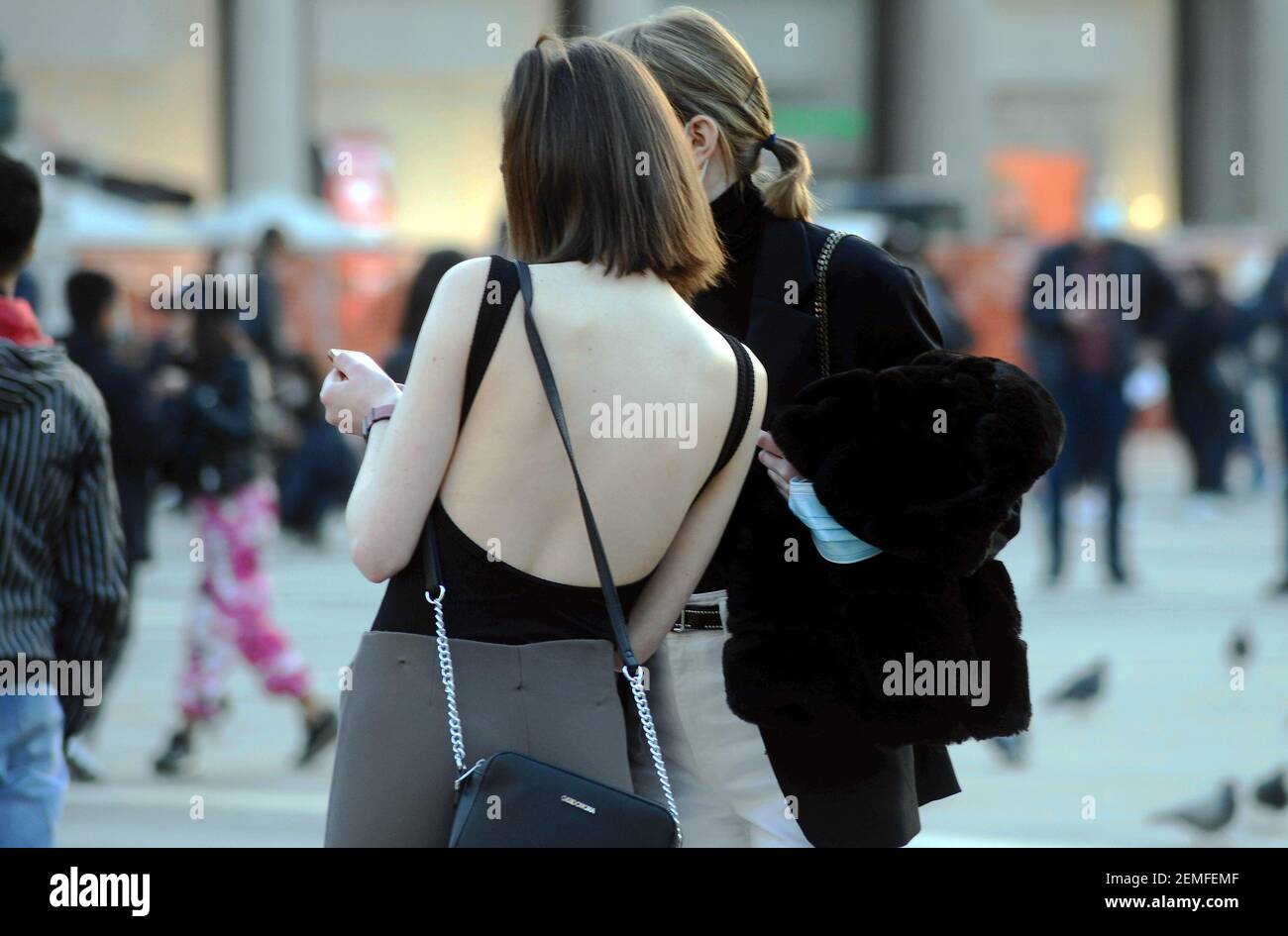 2/25/2021 - Milan, models in the center, hot day people without jackets ...