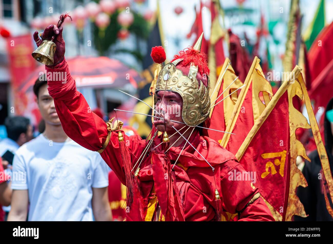 A Tatung seen piercing metal needles through his cheeks during the Cap ...