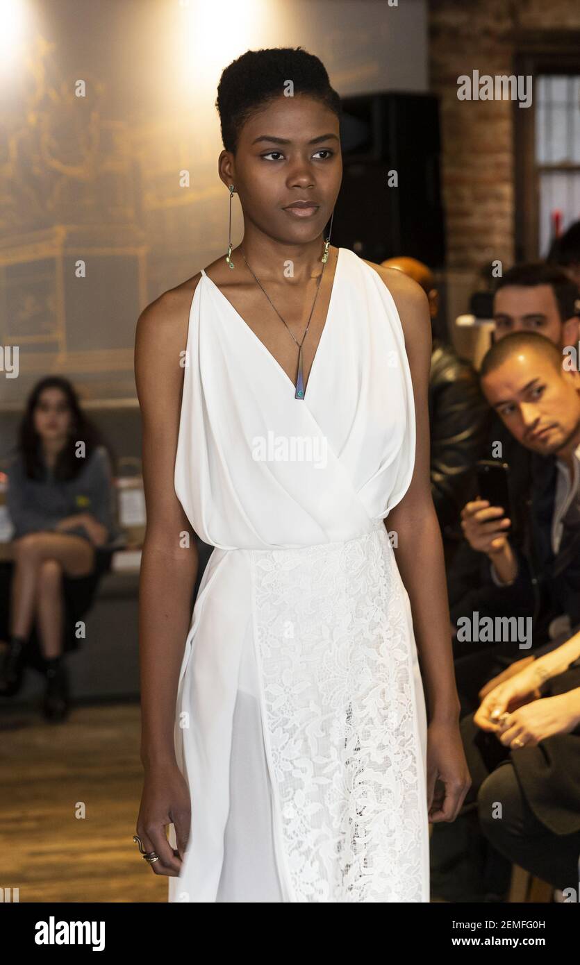 Model walks runway for SCK by Samuel Cirnansck and Luciano Gobbo ...