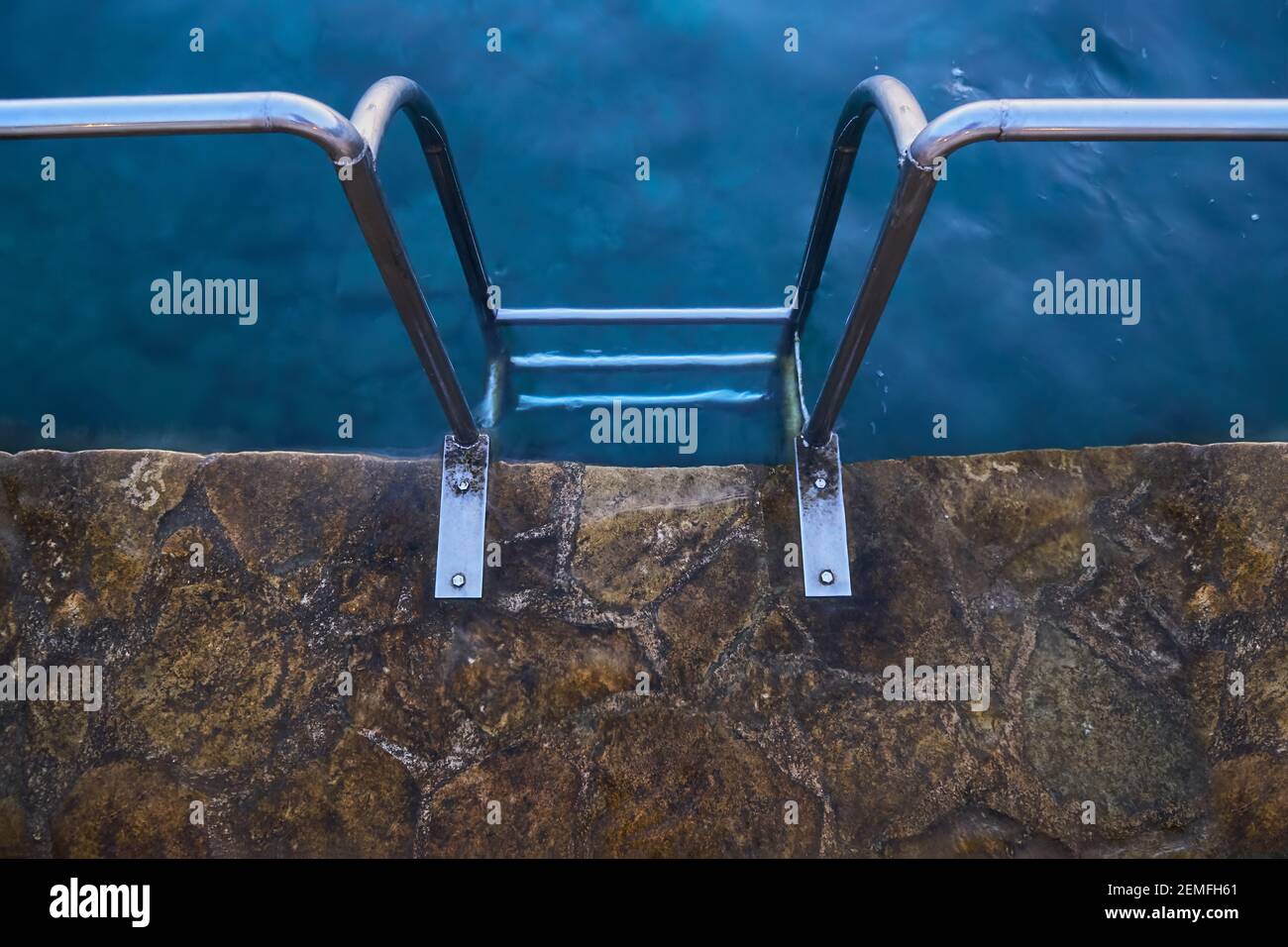 Steel pool ladder hi-res stock photography and images - Alamy