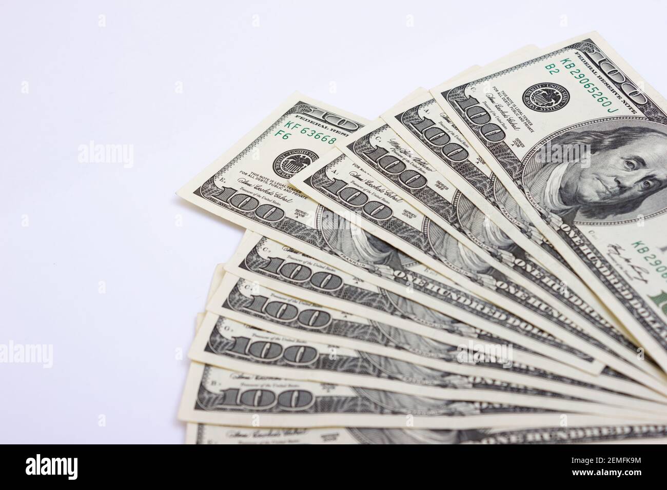 Bundle of dollars on the table close-up, one hundred dollars washington ...