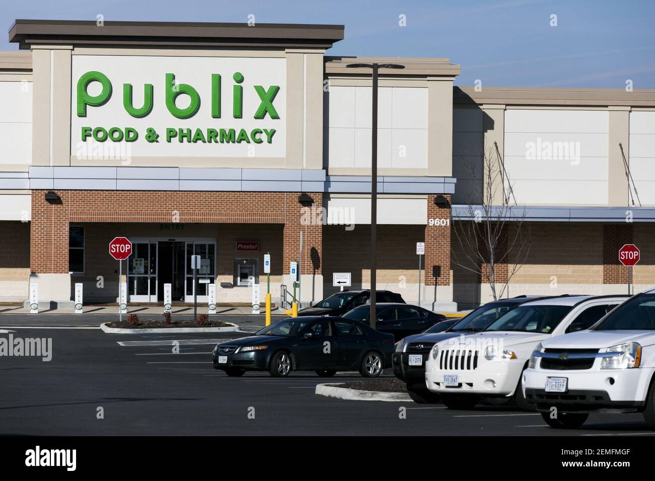 A logo sign outside of a Publix grocery store location in ...