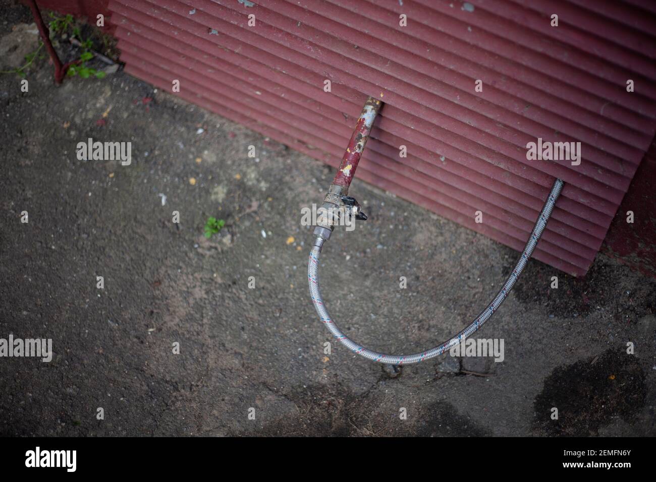 Household water hose. Water from the well flows through this hose ...