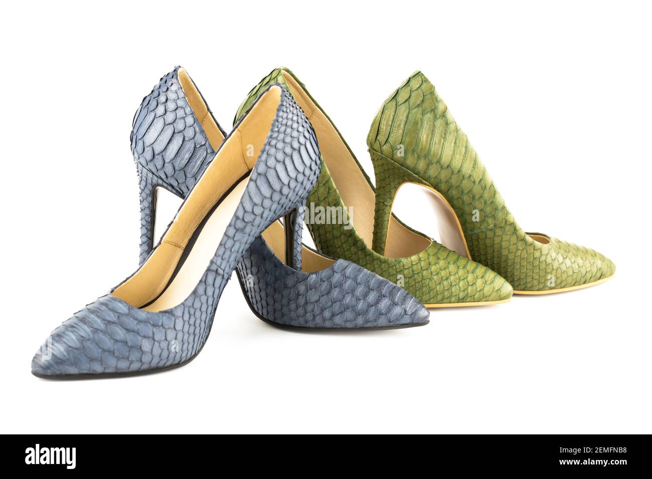 Two pairs of stylish high heels python leather shoes isolated on white ...