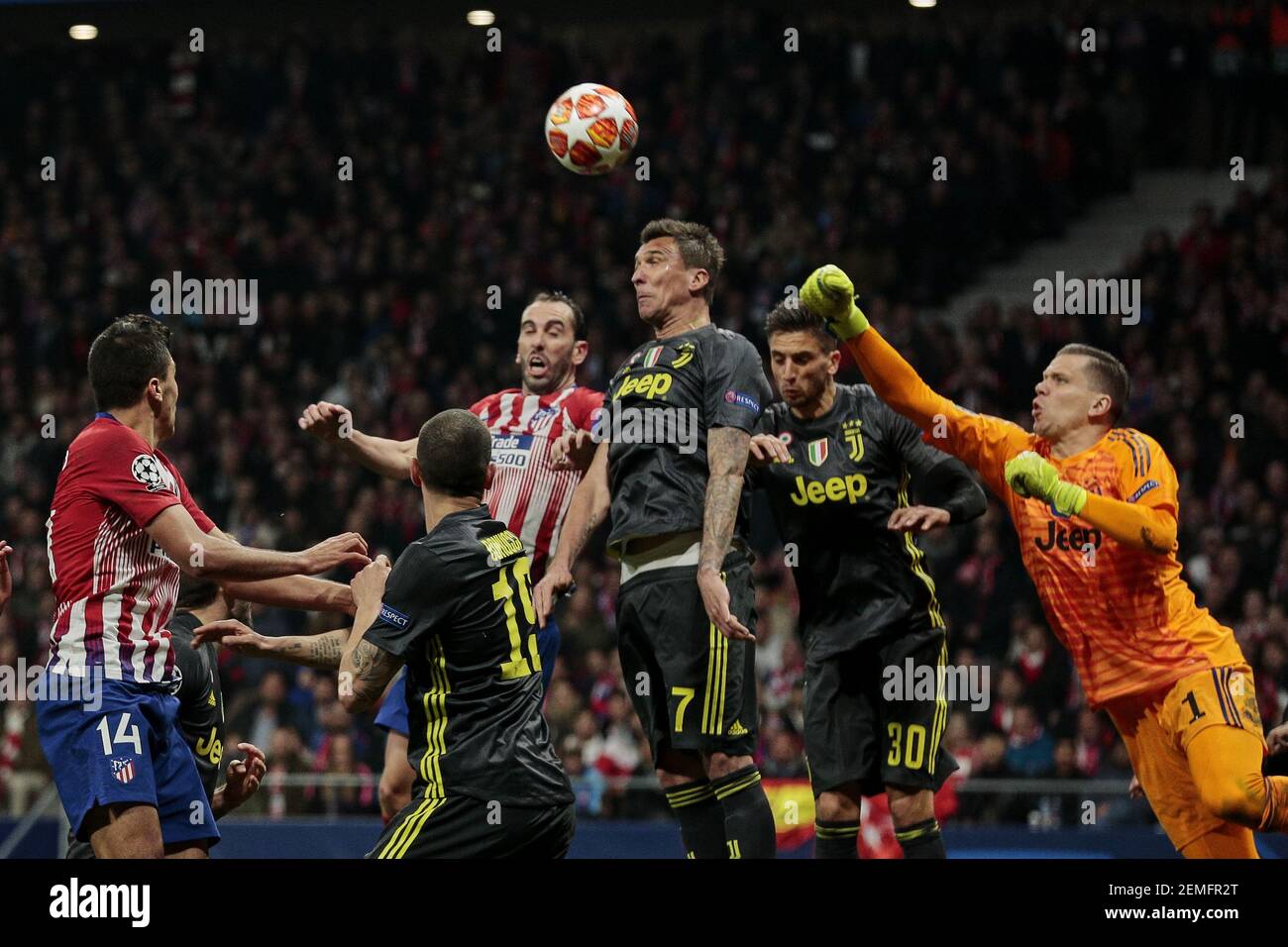 Atletico de Madrid's Diego Godin and Juventus' Mario Mandzukic and ...
