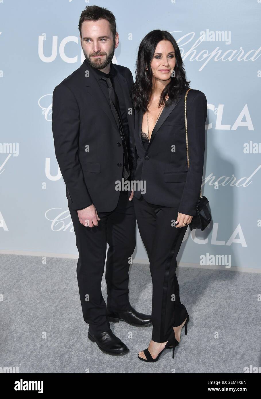 (L-R) Johnny McDaid and Courteney Cox arrives at the UCLA IoES 2019 ...