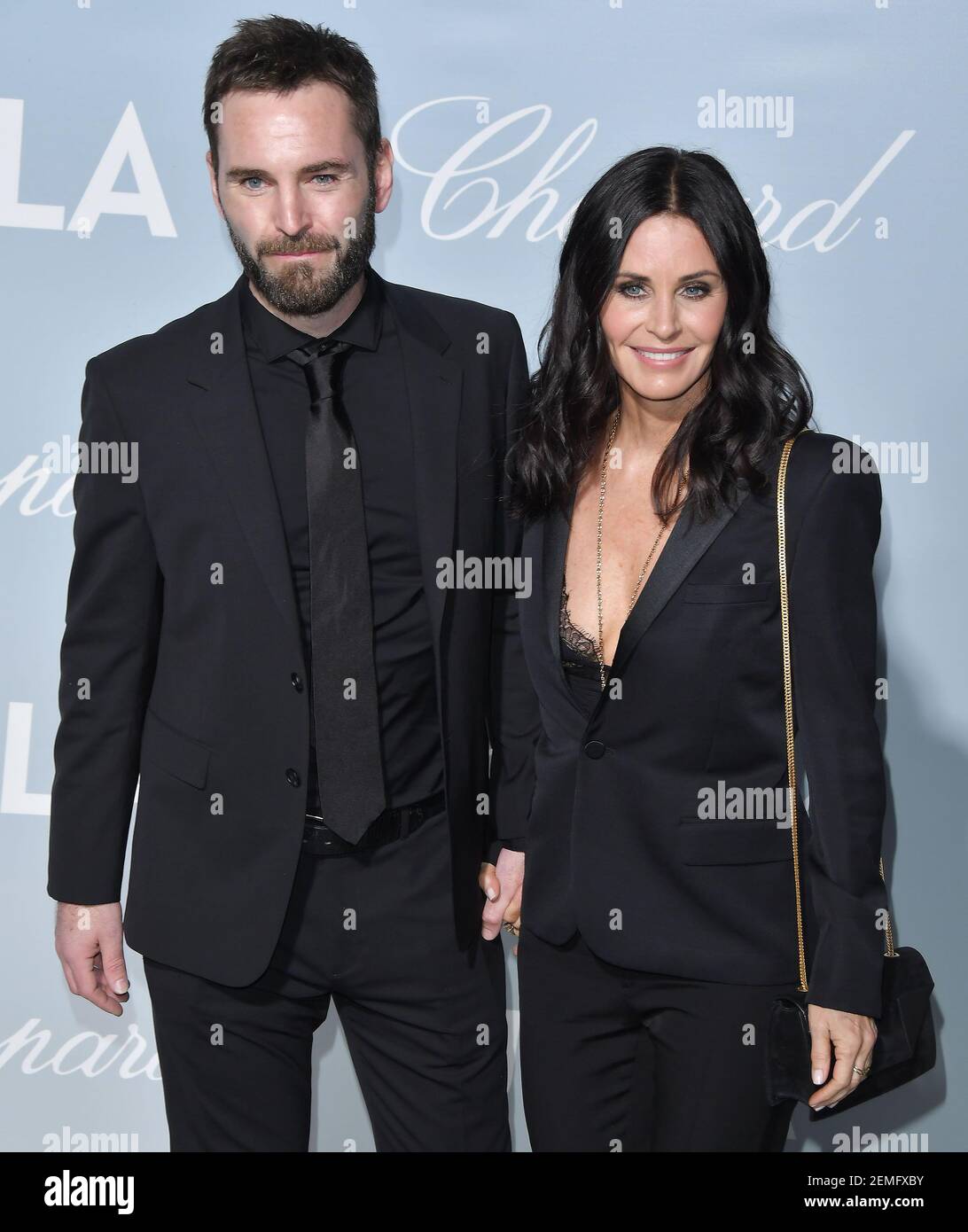 (L-R) Johnny McDaid and Courteney Cox arrives at the UCLA IoES 2019 ...