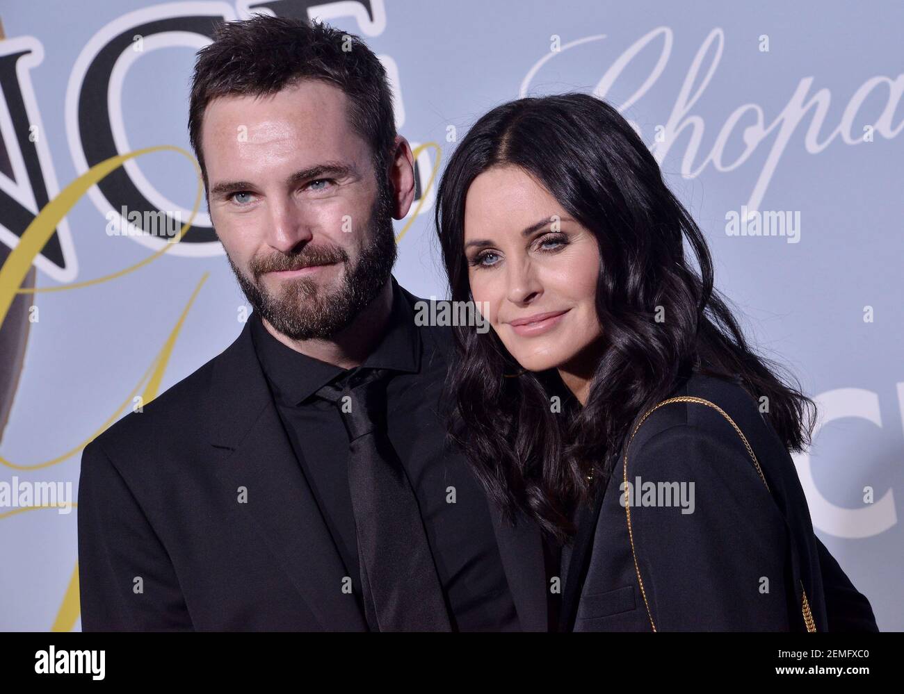 (L-R) Johnny McDaid and Courteney Cox arrives at the UCLA IoES 2019 ...