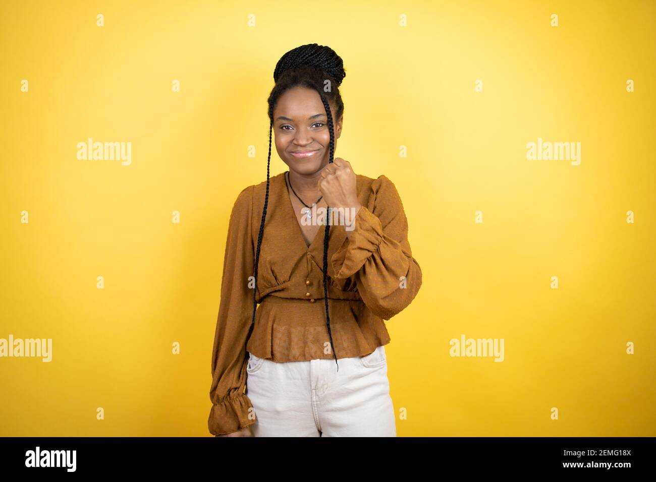 African american woman wearing casual clothes angry and mad raising ...